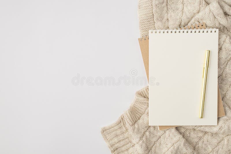 Top View Photo of Two Organizers Pen and Knitted Pullover on Isolated ...