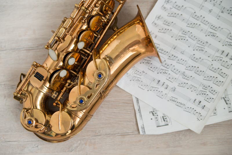 Top View Picture of the Saxophone Laying on the Note Sheets Stock Photo ...
