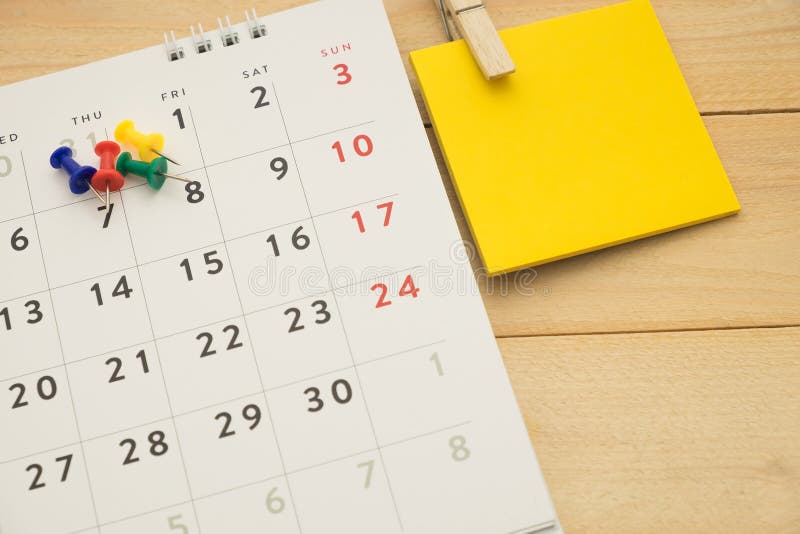 Top View. Pin Putting on Desktop Calendar and Have Post-it Note Stock ...