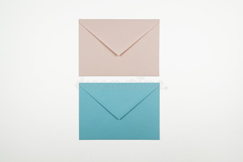 Top View of Pink and Blue Envelopes on White Background. Two Envelopes ...
