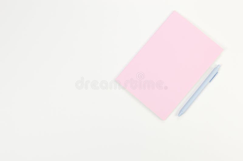 Top View of Pink Notebook, Blue Pen on White Background. School, Office ...