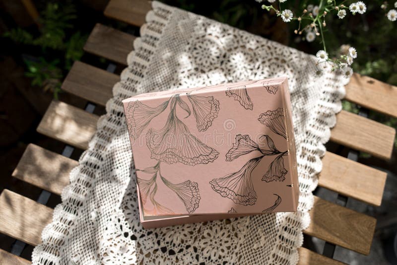 Top View of a Pink Present Box on Wooden Table in the Garden Stock ...