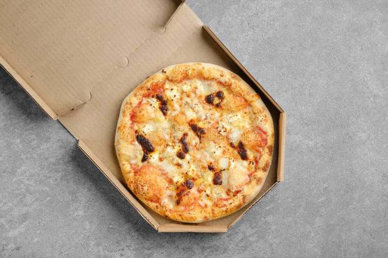Top View of Pizza with Assortment of Cheese in Cardboard Box Stock ...