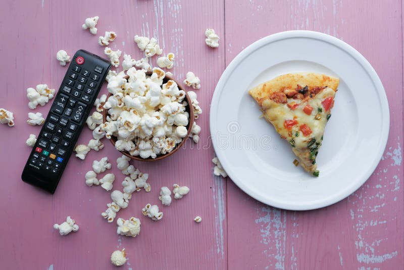 Top View of Pizza, Popcorn and Tv Remote on Table Stock Image - Image ...