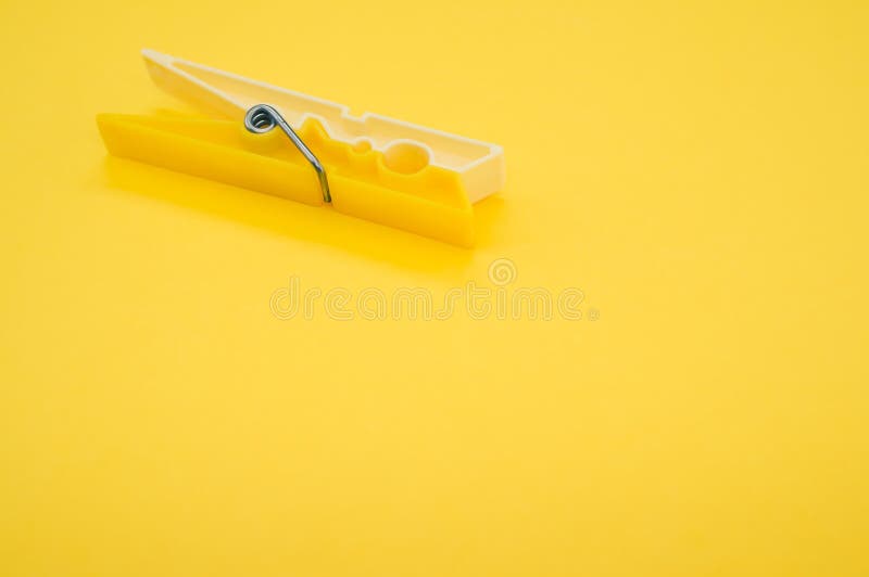 Top View of Plastic Clothespin Isolated on Yellow Background Stock ...