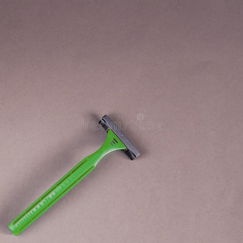 Disposable Razor on a Gray-pink Background Stock Image - Image of clean ...