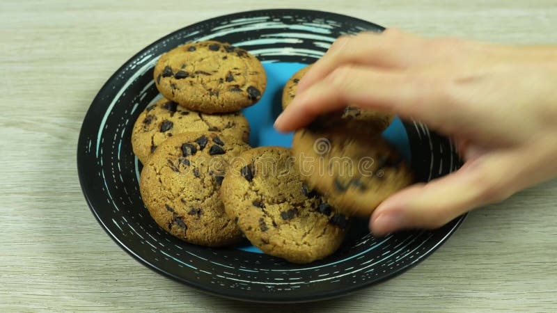 Top View Plate with Cookies. Three People Taking Cookies. Stock Footage ...