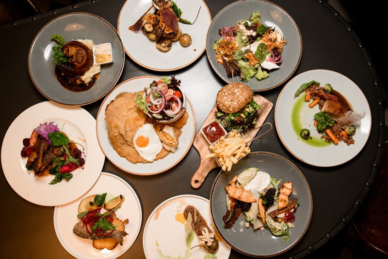 Top View of Plates with Different Dishes on Table Stock Photo - Image ...