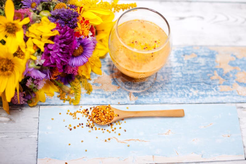 Top View of Pollen in Wooden Spoon and Pollen Liquid Stock Photo ...