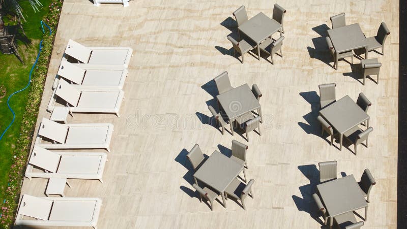 Top View of a Pool Chair Set and Beach Chair with Tile Floor. Stock ...
