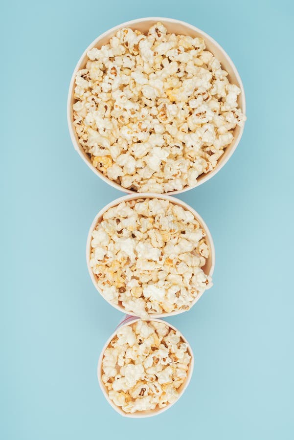 Top View of Popcorn Buckets of Different Sizes in Vertical Row Isolated ...