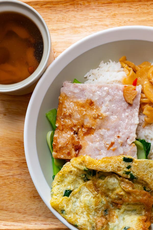 Top View Pork Patty Fried Egg Rice with Pork Tripe and Red Date Soup at ...