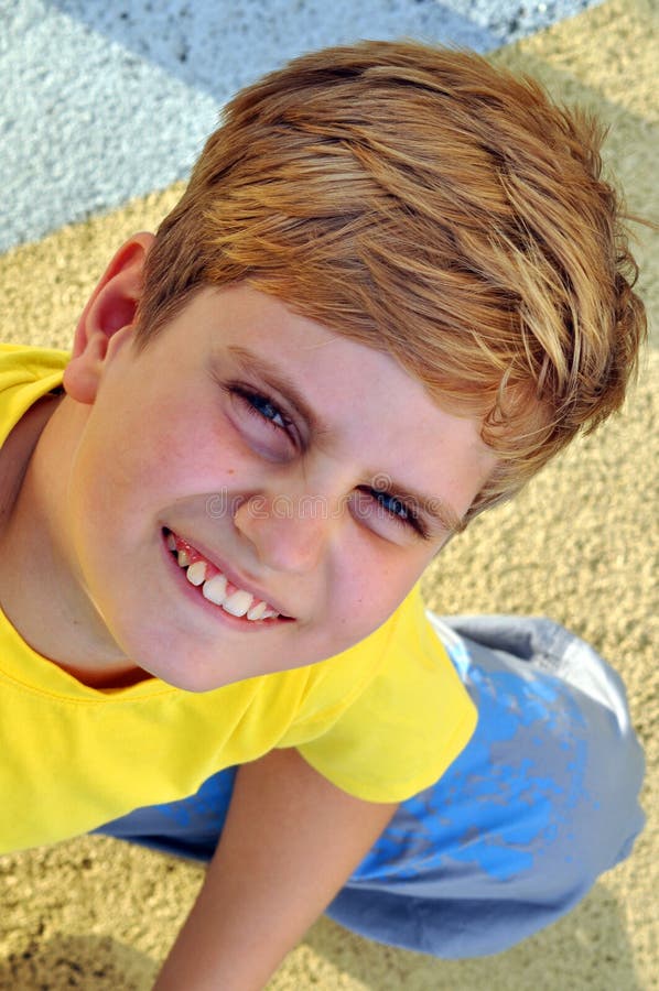 Top View Portrait of a Blond Boy Showing His Teeth Stock Photo - Image ...