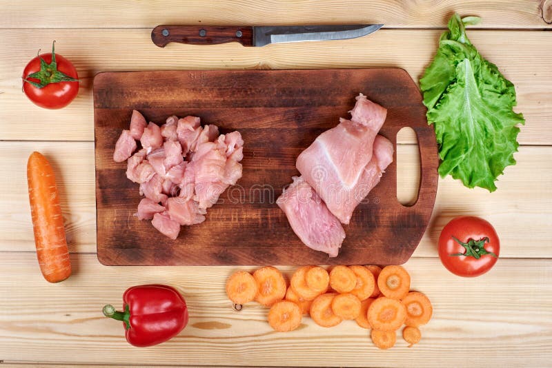 Top View of Preparing Cutting Fresh Raw Chicken with Vegetables. Stock ...