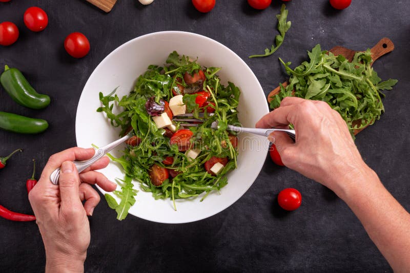 Top View of the Process of Preparing Fresh Vegetable Salad with ...