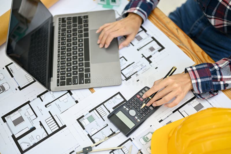 Top View, a Female Architect or Engineer Working at Her Desk, Using ...