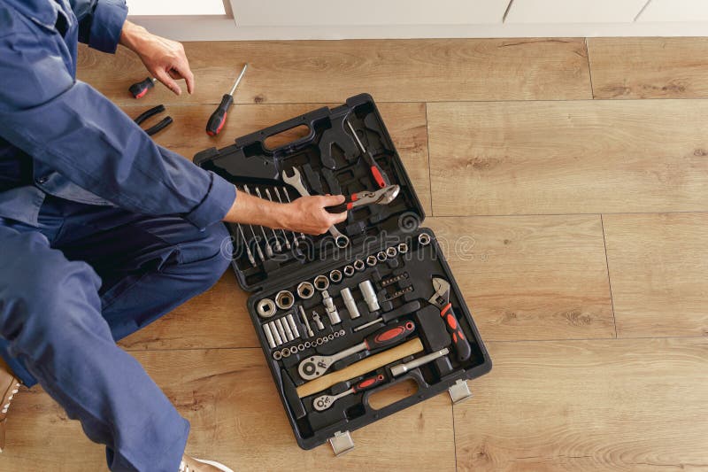 Top View of Professional Handyman with Open Tool Bag Sitting on Home ...