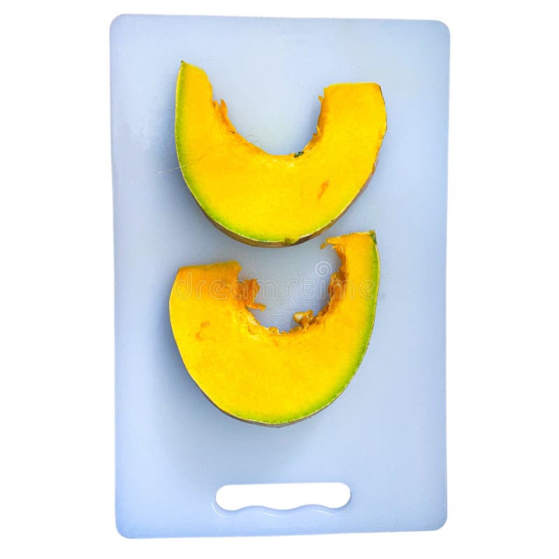 Top View of Pumpkin Slices on a Cutting Board. Isolated on White Stock ...