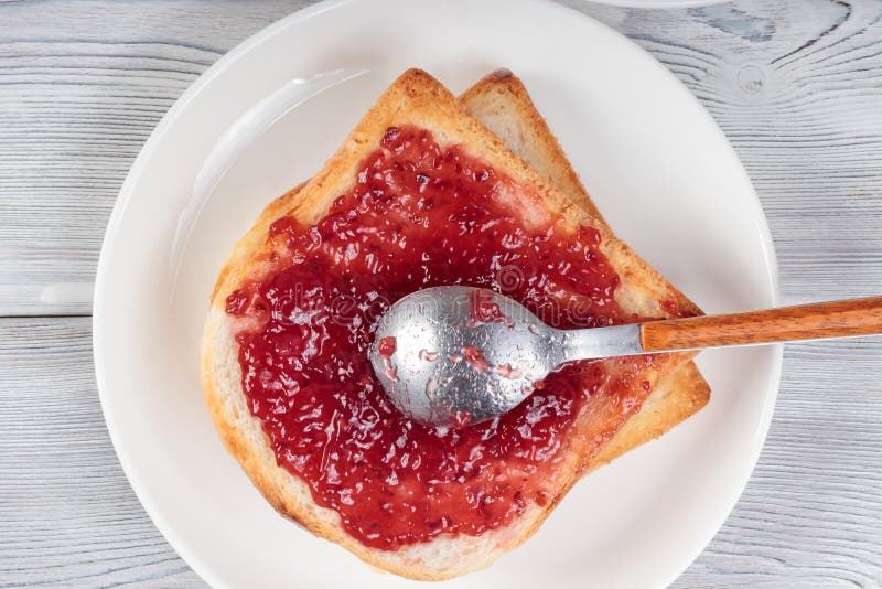 Top View of Raspberry Jam with Toast Bread on White Table Stock Image ...
