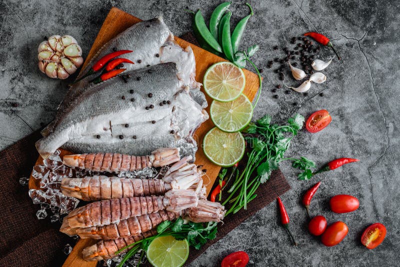 Top View of Raw Fresh Fish and Mantis Shrimp, Lime, Garlic, Peppers ...