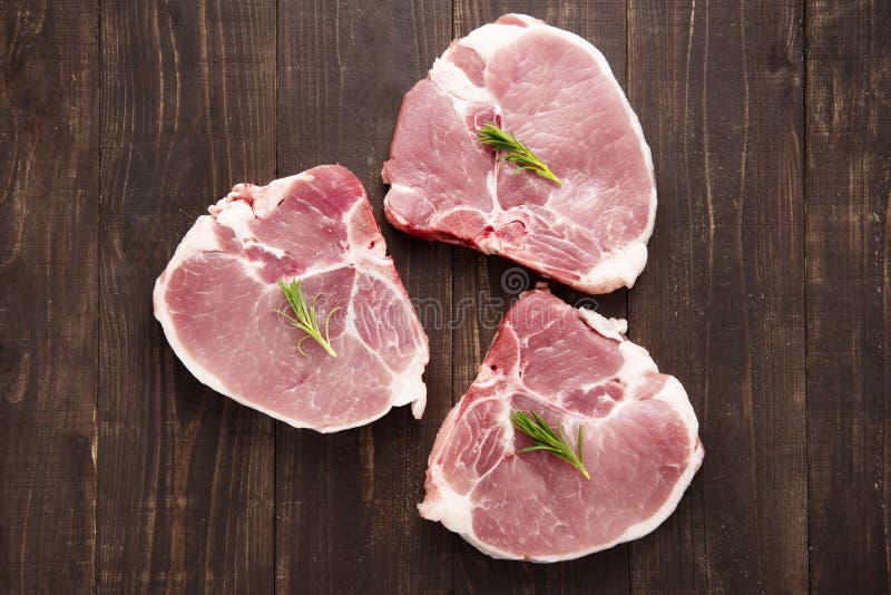 Top View Raw Pork Chop on Wooden Background. Stock Image - Image of ...