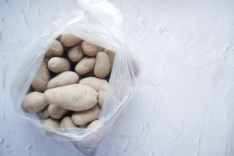 Top View of Raw Potato in a Plastic Bag on Table Stock Image - Image of ...