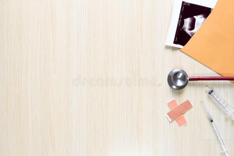 Top View of X-ray Paper in Envelope with Stethoscopes, Plaster a Stock ...