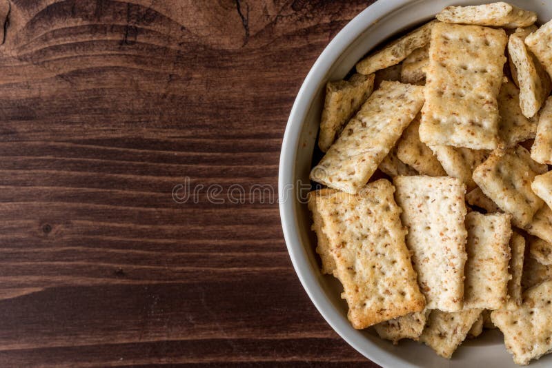 Top View of Rectangular Crackers in the Bowl on the Wooden Table with ...