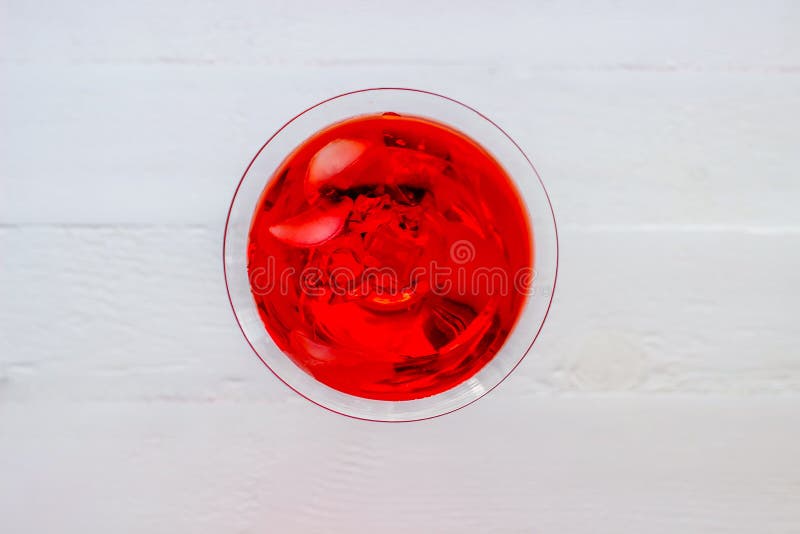 Top View of Red Alcohol Cocktail with Ice on the White Wood Table ...