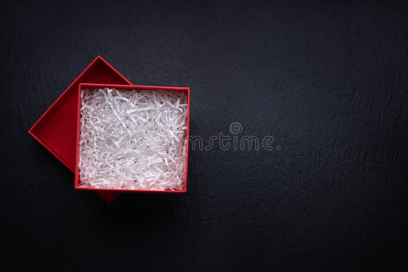 Top View of Red Box for Gift Filled with Decorative Shredded White ...
