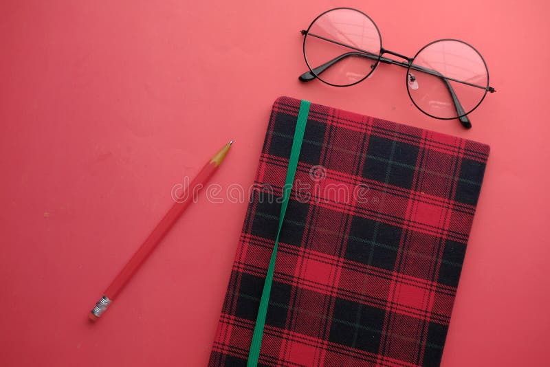 Top View of Red Color Notepad, Pencil and Eyeglass Stock Photo - Image ...