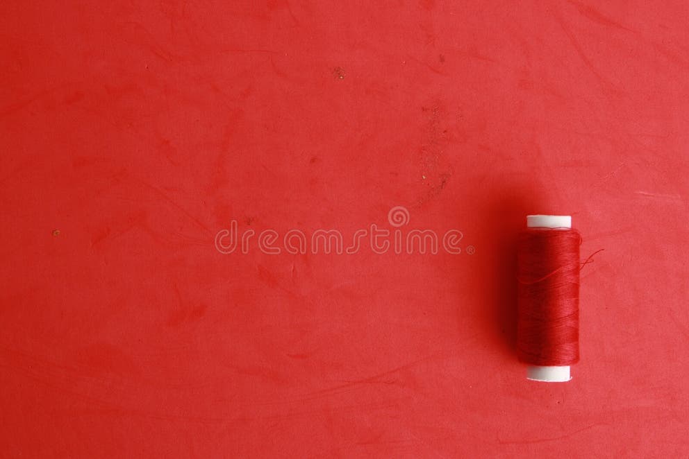 Top View of a Red Sewing Thread on a Red Background Stock Photo - Image ...