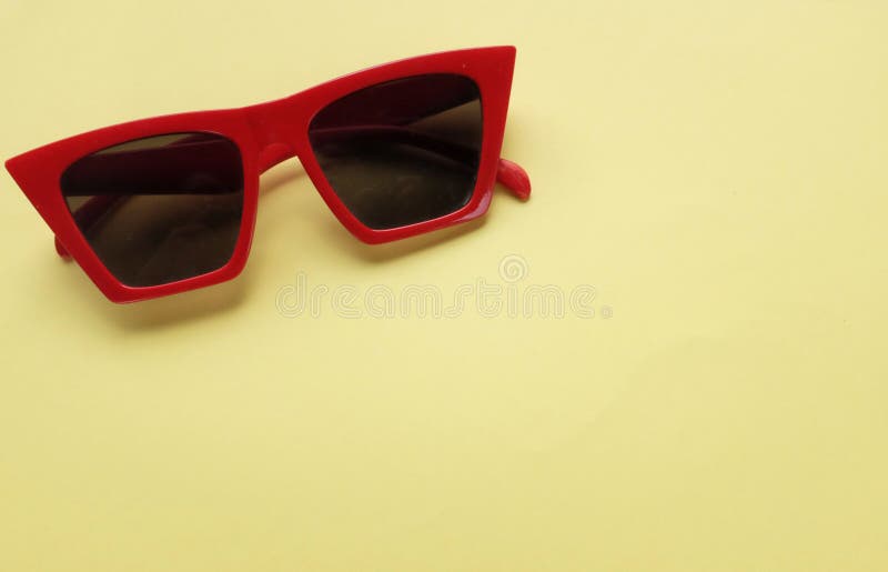 Red Sunglasses Isolated Over the Yellow Background Stock Image - Image ...