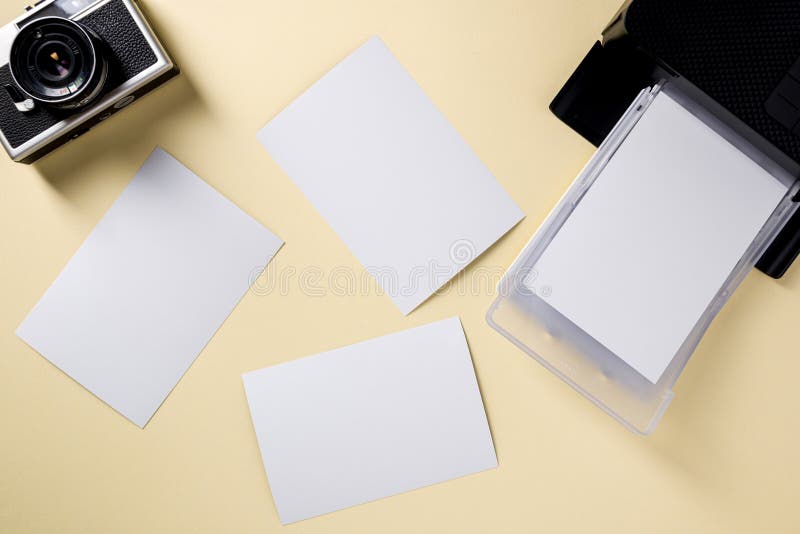 Top View of Retro Camera, Blank Photo Papers and Mobile Photo Printer ...