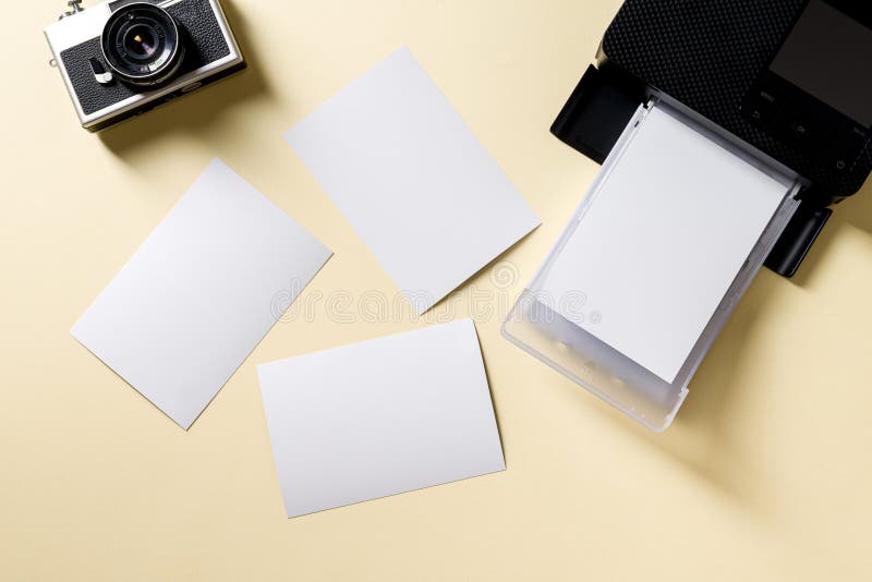 Top View of Retro Camera, Blank Photo Papers and Mobile Photo Printer ...
