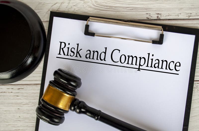 Top View of Risk and Compliance Text on Clipboard with Gavel on Top ...