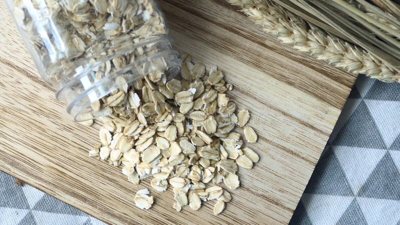 Top View of Roasted Oats Flakes on Table Stock Video - Video of seed ...