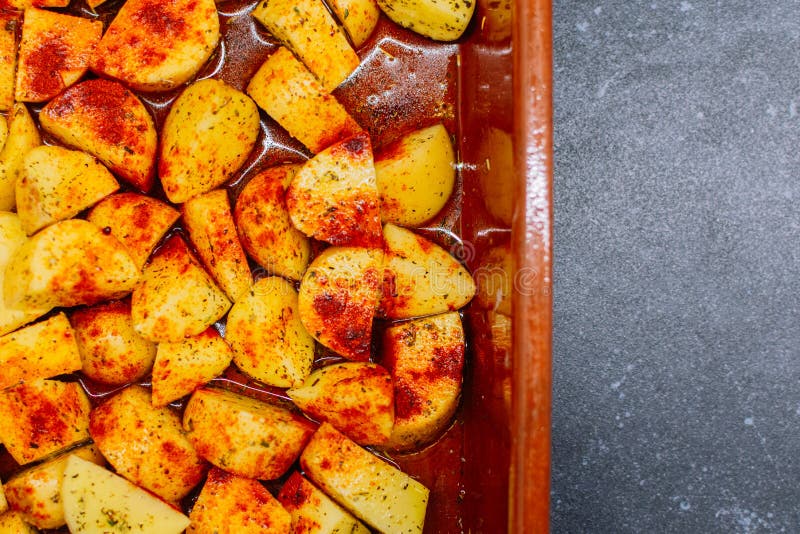Roasted Potatoes with Tasty Spices Stock Image - Image of black ...