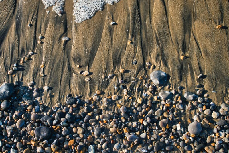 Top View of the Rocks and Sand of the Coast Under the Sunlight Stock ...