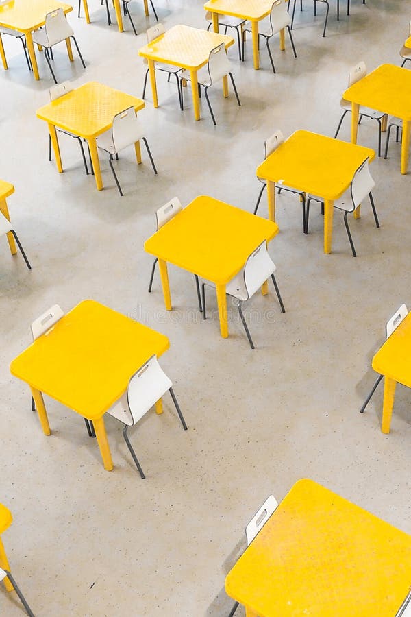 Top View of Rows of Yellow Tables and White Chairs Stock Image - Image ...