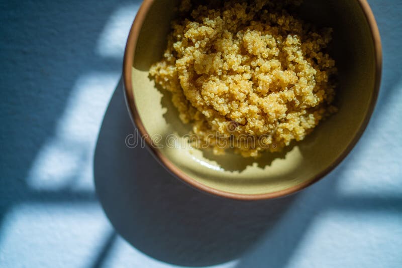 Top View of a Rustic Bowl with Quinoa Oatmeal on the White Table with ...