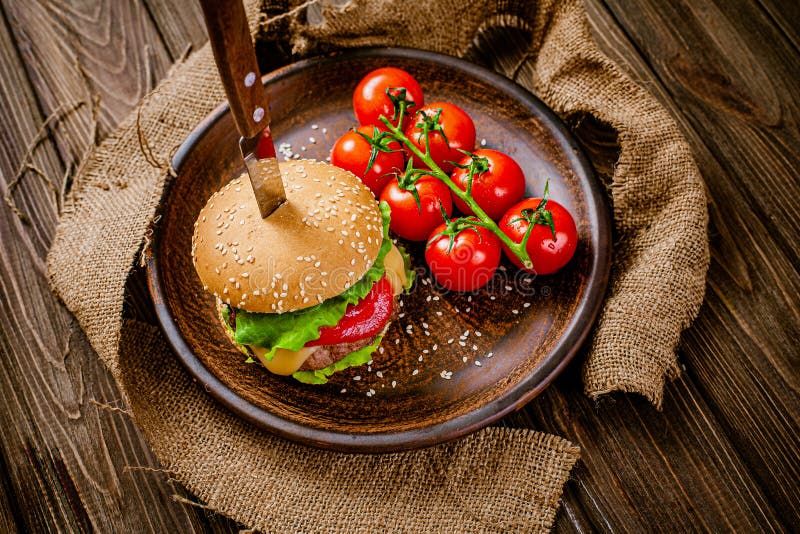 Top View of Rustic Serving Classic Beef Burger with Knife on Wooden ...