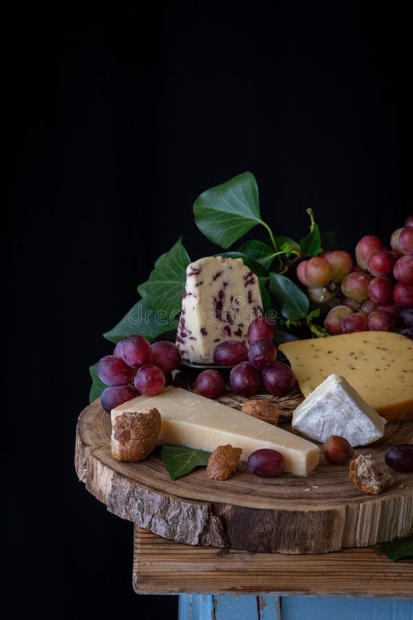 Top View of Rustic Table with Pieces of Cheese with Cumin, Goat Cheese ...