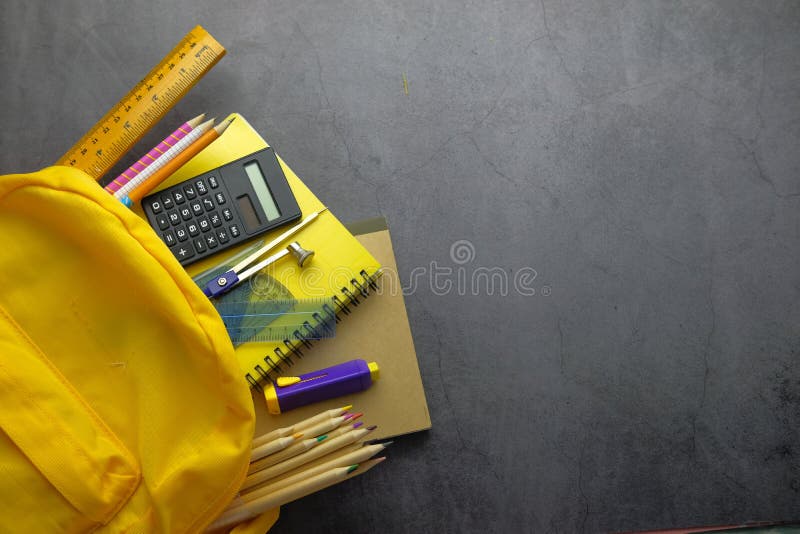 Top View of School Bag with School Suppliers on Table Stock Photo ...
