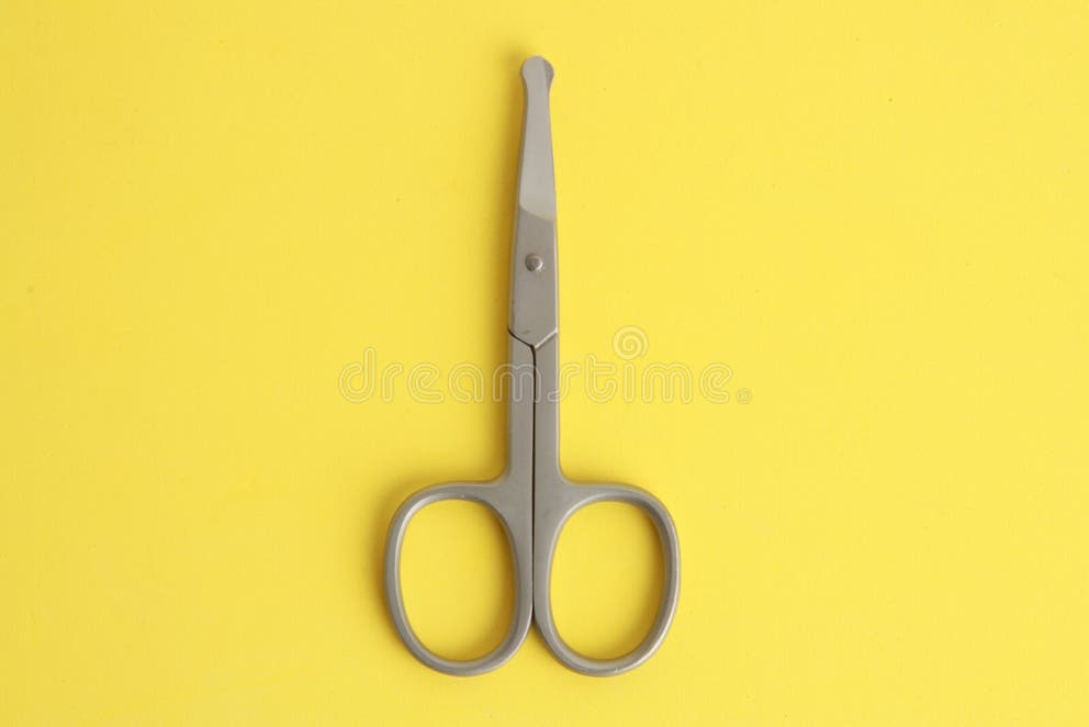 Top View of the Scissors on the Yellow Surface Stock Image - Image of ...