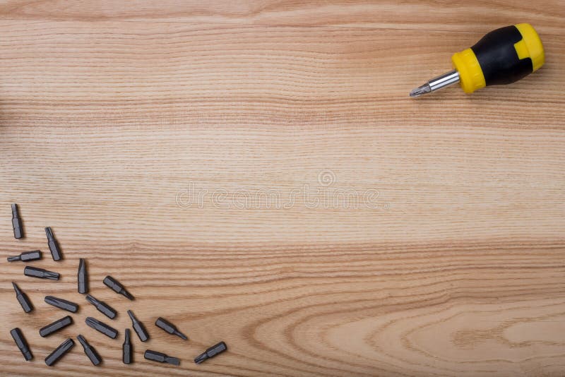 Top View Screwdriver with Set of Bits on Wooden Table Stock Photo ...