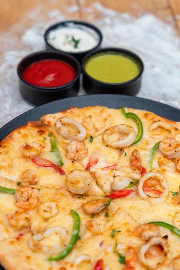 Top View of a Seafood Pizza with Sauces Stock Photo - Image of tasty ...
