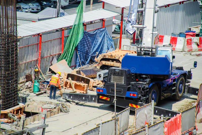 Top View See the Construction Site of Workers Working and Trucks that ...
