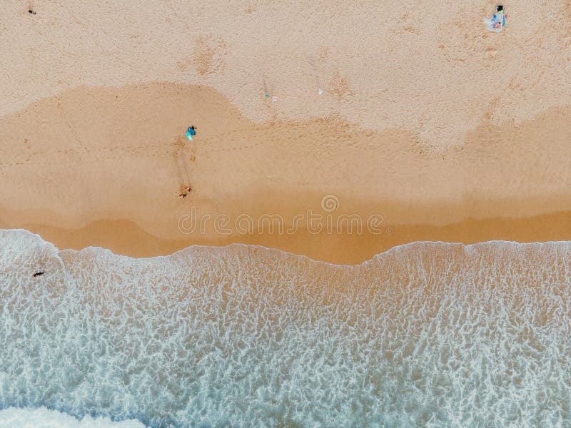 Top View of a Serene Beach with the Waves Lapping the Shore Stock Photo ...