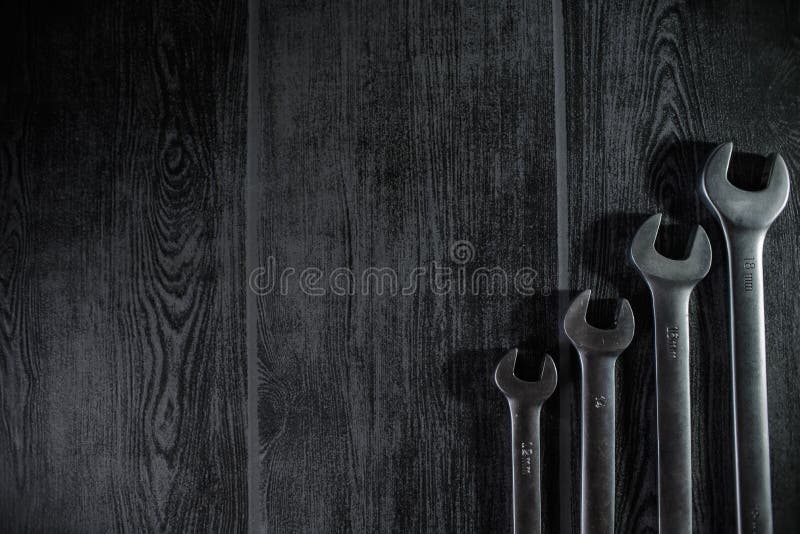 Top View Set of Open End Wrenches on Dark Wooden Background, Copy Space ...